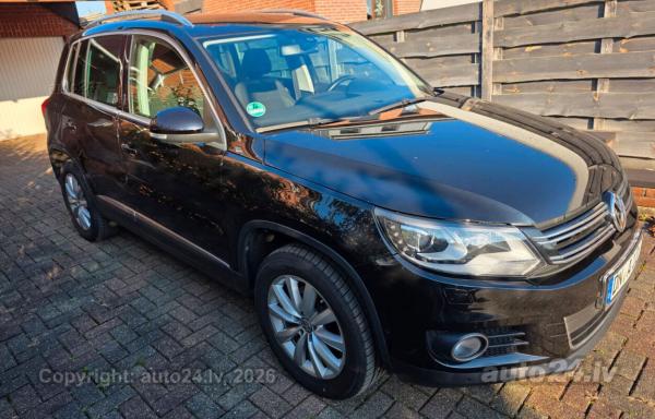 Melns Volkswagen Tiguan 2012 Tartu, ar dzinēja tilpumu 2.00 L un nobraukumu 198 tūkst. km par 9790 €, foto 1 vietnē AUTOMOTO.COM.LV