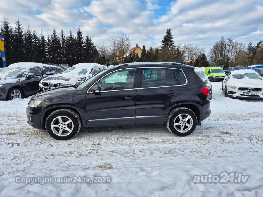 Black Volkswagen Tiguan 2012 in Tartu, with an engine capacity of 2.00 L and mileage of 200 thousand km for 9790 €, photo 6 on AUTOMOTO.COM.LV