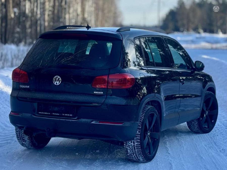 Melns Volkswagen Tiguan 2012 Radviliškis, ar dzinēja tilpumu 2.00 L un nobraukumu 220 tūkst. km par 7500 €, foto 12 vietnē AUTOMOTO.COM.LV