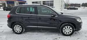 Black Volkswagen Tiguan 2012 in Vilnius, with an engine capacity of 1.97 L and mileage of 314 thousand km for 7000 €, photo 4 on AUTOMOTO.COM.LV