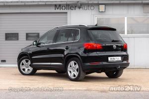 Black Volkswagen Tiguan 2012 in Jelgava, with an engine capacity of 2.00 L and mileage of 264 thousand km for 10700 €, photo 5 on AUTOMOTO.COM.LV
