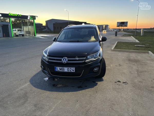 Black Volkswagen Tiguan 2012 in Kaunas, with an engine capacity of 2.00 L and mileage of 297 thousand km for 9000 €, photo 1 on AUTOMOTO.COM.LV