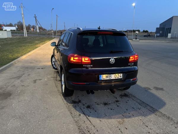 Black Volkswagen Tiguan 2012 in Kaunas, with an engine capacity of 2.00 L and mileage of 297 thousand km for 9000 €, photo 2 on AUTOMOTO.COM.LV