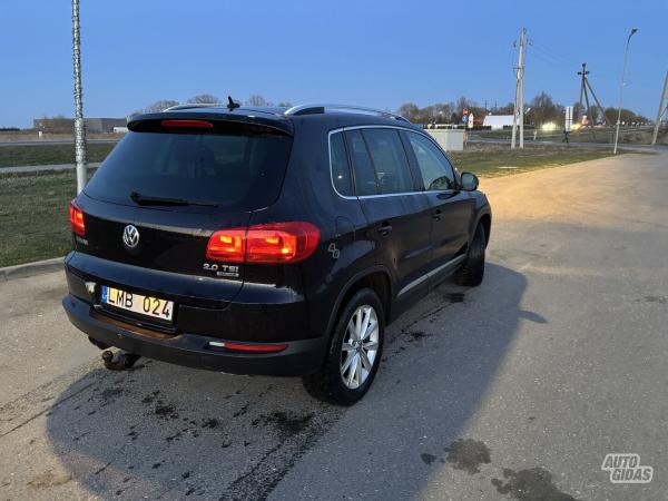 Black Volkswagen Tiguan 2012 in Kaunas, with an engine capacity of 2.00 L and mileage of 297 thousand km for 9000 €, photo 4 on AUTOMOTO.COM.LV