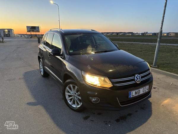 Black Volkswagen Tiguan 2012 in Kaunas, with an engine capacity of 2.00 L and mileage of 297 thousand km for 9000 €, photo 5 on AUTOMOTO.COM.LV