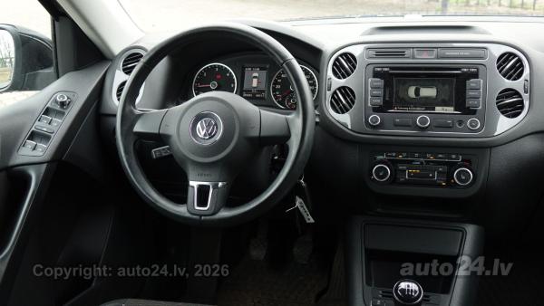 Black Volkswagen Tiguan 2012 in Tartu, with an engine capacity of 2.00 L and mileage of 206 thousand km for 10990 €, photo 7 on AUTOMOTO.COM.LV