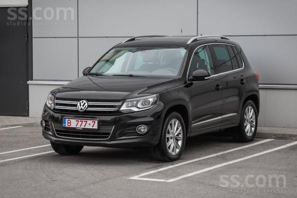 Black Volkswagen Tiguan 2012 in Riga, with an engine capacity of 2.00 L and mileage of 242 thousand km for 9990 €, photo 1 on AUTOMOTO.COM.LV