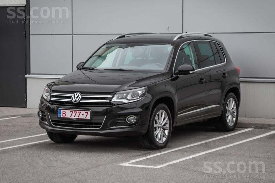 Black Volkswagen Tiguan 2012 in Riga, with an engine capacity of 2.00 L and mileage of 242 thousand km for 9990 €, photo 1 on AUTOMOTO.COM.LV
