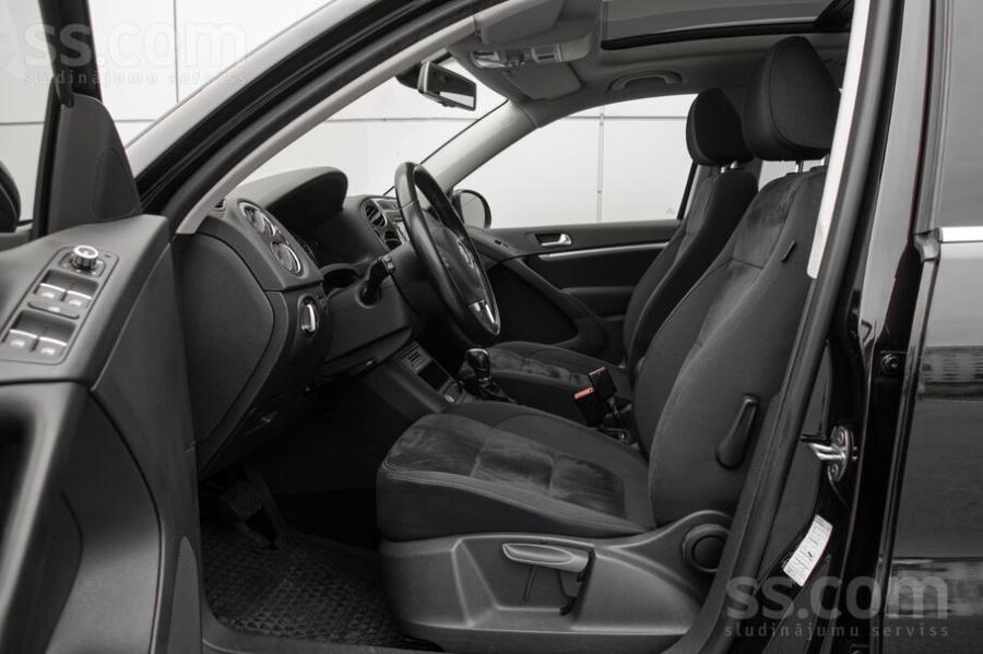 Black Volkswagen Tiguan 2012 in Riga, with an engine capacity of 2.00 L and mileage of 242 thousand km for 9990 €, photo 9 on AUTOMOTO.COM.LV