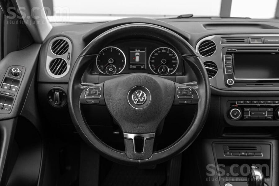 Black Volkswagen Tiguan 2012 in Riga, with an engine capacity of 2.00 L and mileage of 242 thousand km for 9990 €, photo 19 on AUTOMOTO.COM.LV