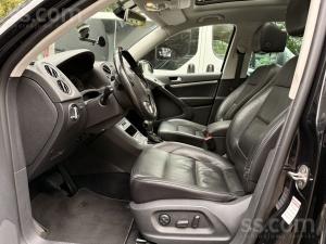 Black Volkswagen Tiguan 2012 in Riga, with an engine capacity of 2.00 L and mileage of 0 thousand km for 8500 €, photo 13 on AUTOMOTO.COM.LV