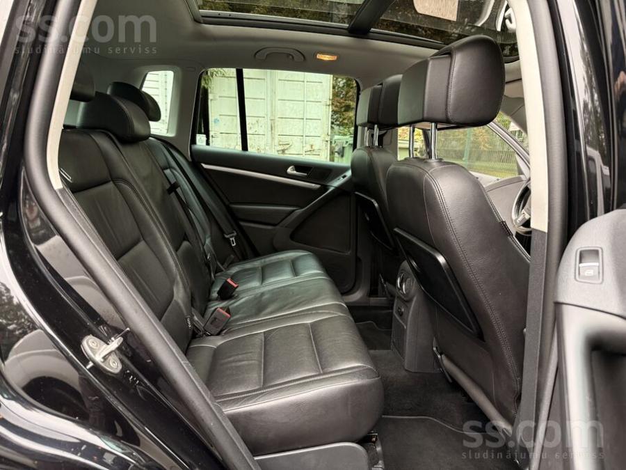 Black Volkswagen Tiguan 2012 in Riga, with an engine capacity of 2.00 L and mileage of 0 thousand km for 8500 €, photo 14 on AUTOMOTO.COM.LV