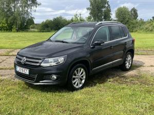 Black Volkswagen Tiguan 2012 in Riga, with an engine capacity of 2.00 L and mileage of 300 thousand km for 6800 €, photo  on AUTOMOTO.COM.LV