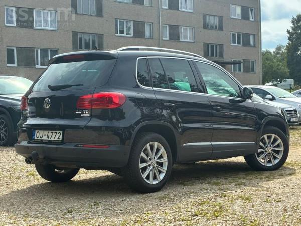 Volkswagen Tiguan 2012 KuldÄ«ga vietnÄ Melns Volkswagen Tiguan 2012 KuldÄ«ga, ar dzinÄja tilpumu 2.00 L un nobraukumu 320 tÅ«kst. km par 7890 ā¬, foto 4 vietnÄ AUTOMOTO.COM.LV