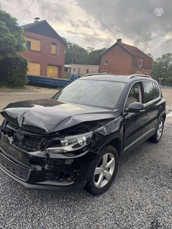 Melns Volkswagen Tiguan 2012 Kauņa, ar dzinēja tilpumu 1.97 L un nobraukumu 245 tūkst. km par 3650 €, foto 4 vietnē AUTOMOTO.COM.LV