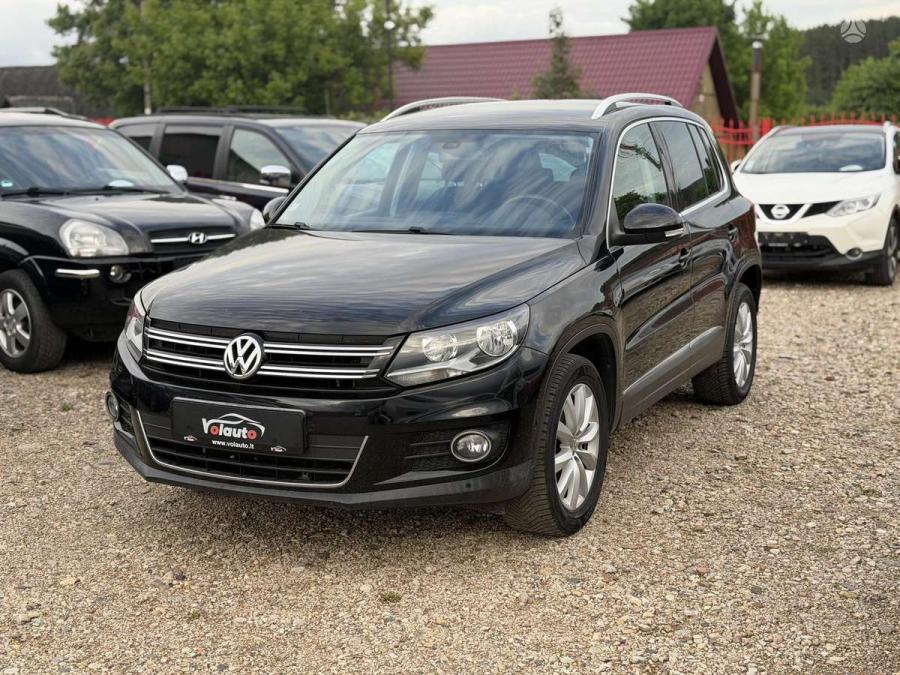 Black Volkswagen Tiguan 2012 in Vilnius, with an engine capacity of 1.97 L and mileage of 243 thousand km for 8500 €, photo 1 on AUTOMOTO.COM.LV