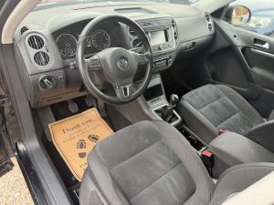 Black Volkswagen Tiguan 2012 in Vilnius, with an engine capacity of 1.97 L and mileage of 243 thousand km for 8500 €, photo 13 on AUTOMOTO.COM.LV
