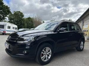 Black Volkswagen Tiguan 2012 in Limbazi, with an engine capacity of 2.00 L and mileage of 276 thousand km for 9250 €, photo  on AUTOMOTO.COM.LV