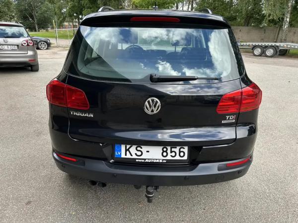 Black Volkswagen Tiguan 2012 in Limbazi, with an engine capacity of 2.00 L and mileage of 276 thousand km for 9250 €, photo 5 on AUTOMOTO.COM.LV