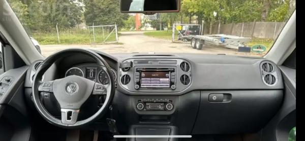 Black Volkswagen Tiguan 2012 in Limbazi, with an engine capacity of 2.00 L and mileage of 276 thousand km for 9250 €, photo 8 on AUTOMOTO.COM.LV