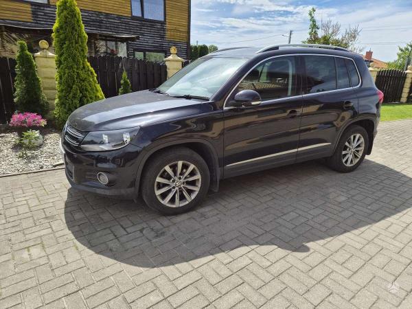 Black Volkswagen Tiguan 2012 in Kaunas, with an engine capacity of 1.97 L and mileage of 250 thousand km for 2700 €, photo 1 on AUTOMOTO.COM.LV