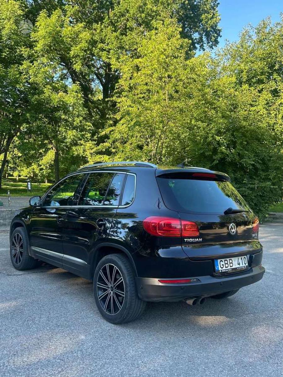 Melns Volkswagen Tiguan 2012 Klaipėda, ar dzinēja tilpumu 1.97 L un nobraukumu 141 tūkst. km par 9100 €, foto 19 vietnē AUTOMOTO.COM.LV