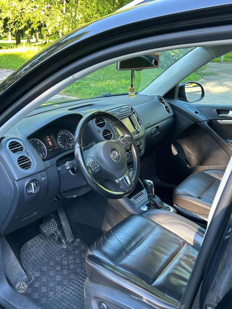 Melns Volkswagen Tiguan 2012 Klaipėda, ar dzinēja tilpumu 1.97 L un nobraukumu 141 tūkst. km par 9100 €, foto 26 vietnē AUTOMOTO.COM.LV