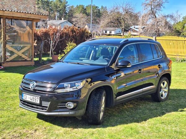 Black Volkswagen Tiguan 2012 in Jelgava, with an engine capacity of 1.40 L and mileage of 235 thousand km for 6850 €, photo 1 on AUTOMOTO.COM.LV