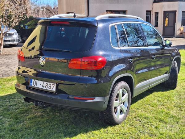 Black Volkswagen Tiguan 2012 in Jelgava, with an engine capacity of 1.40 L and mileage of 235 thousand km for 6850 €, photo 4 on AUTOMOTO.COM.LV