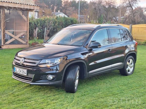 Black Volkswagen Tiguan 2012 in Jelgava, with an engine capacity of 1.40 L and mileage of 235 thousand km for 6850 €, photo 7 on AUTOMOTO.COM.LV
