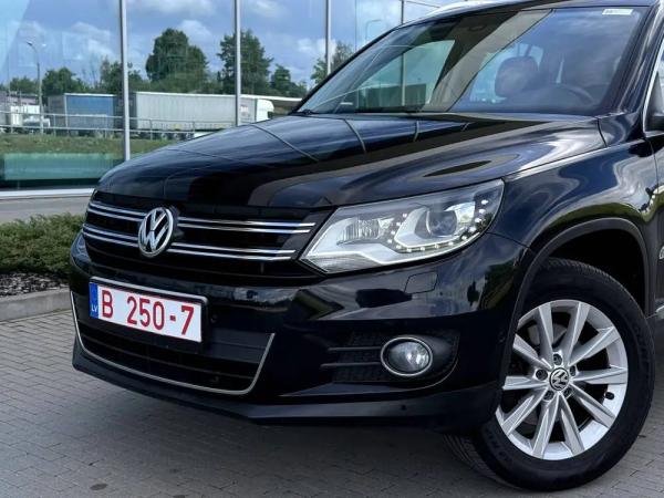 Melns Volkswagen Tiguan 2012 Rēzekne, ar dzinēja tilpumu 2.00 L un nobraukumu 185 tūkst. km par 10990 €, foto 3 vietnē AUTOMOTO.COM.LV