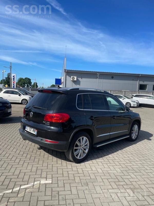 Melns Volkswagen Tiguan 2012 Rīga, ar dzinēja tilpumu 2.00 L un nobraukumu 280 tūkst. km par 8200 €, foto 3 vietnē AUTOMOTO.COM.LV