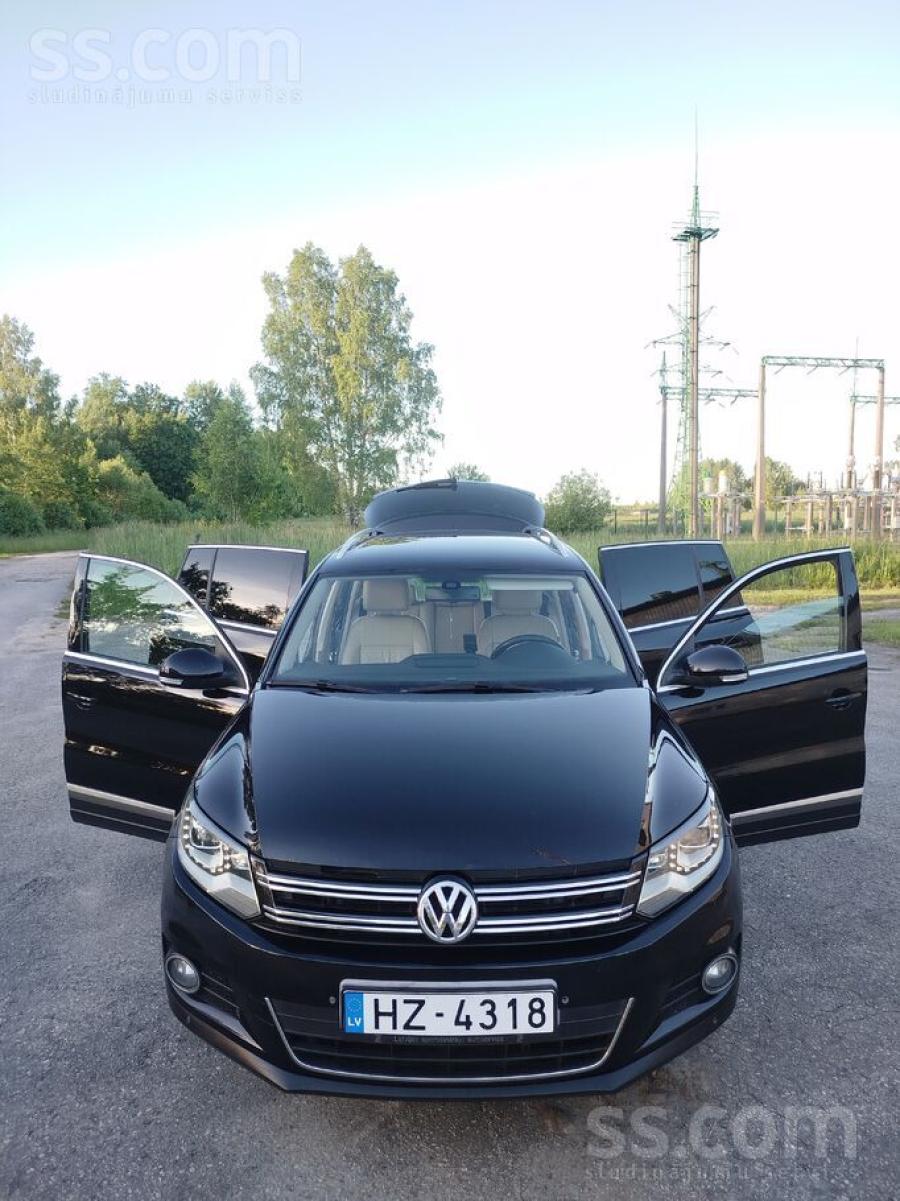 Black Volkswagen Tiguan 2012 in Ogre, with an engine capacity of 2.00 L and mileage of 415 thousand km for 5700 €, photo 5 on AUTOMOTO.COM.LV