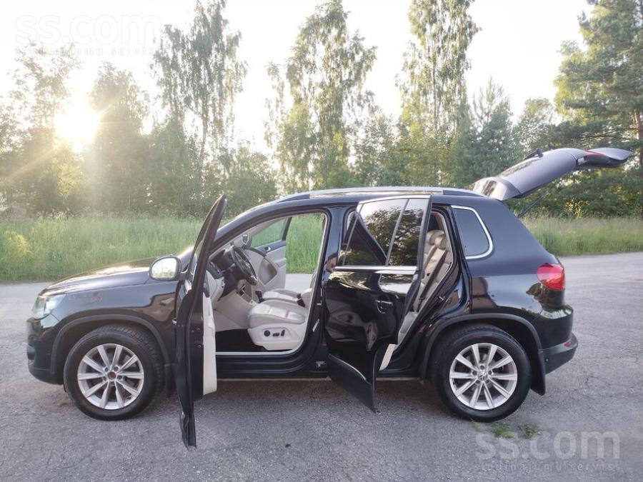 Black Volkswagen Tiguan 2012 in Ogre, with an engine capacity of 2.00 L and mileage of 415 thousand km for 5700 €, photo 8 on AUTOMOTO.COM.LV