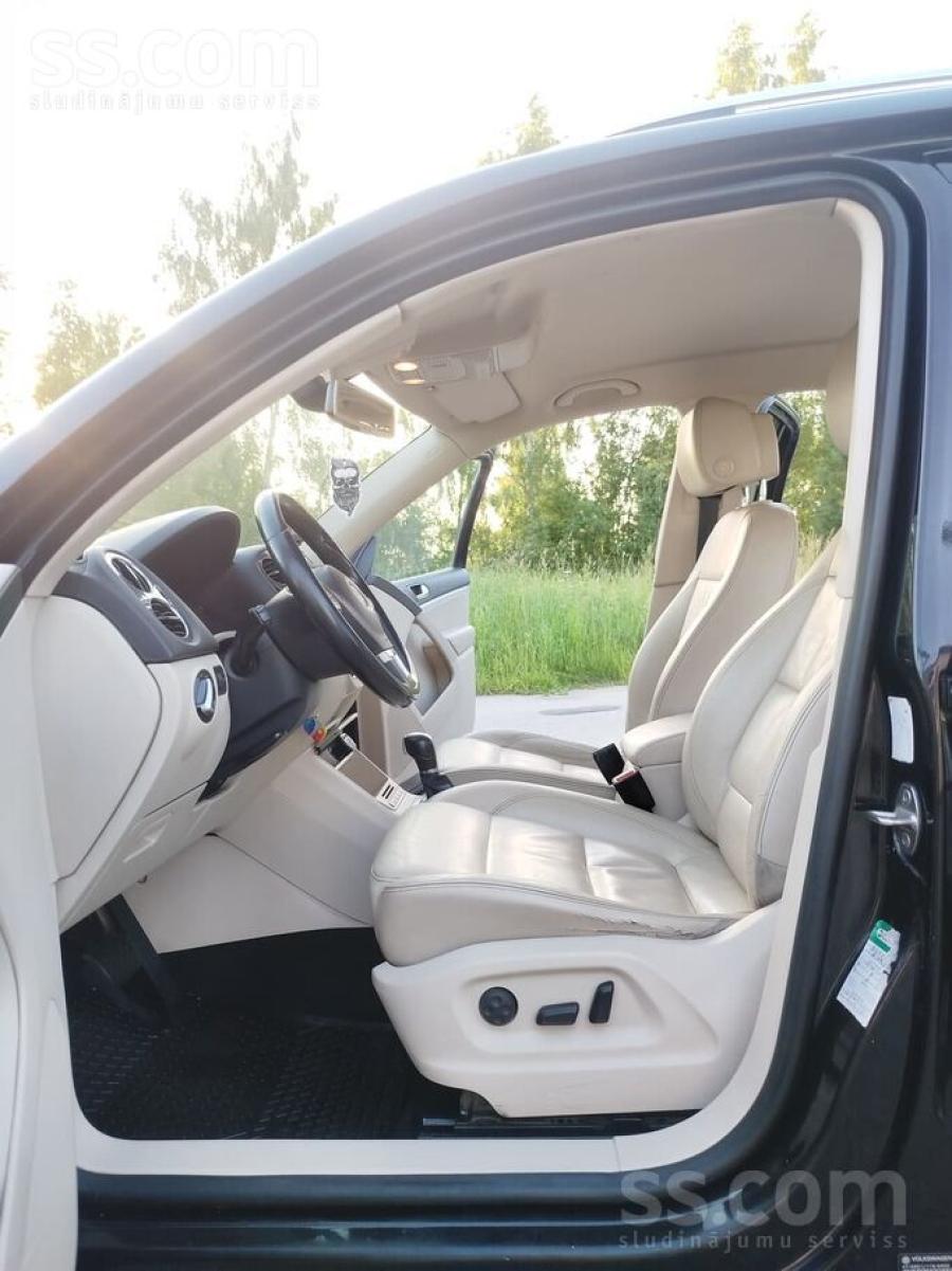 Black Volkswagen Tiguan 2012 in Ogre, with an engine capacity of 2.00 L and mileage of 415 thousand km for 5700 €, photo 10 on AUTOMOTO.COM.LV