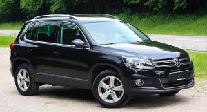 Black Volkswagen Tiguan 2012 in Kretinga, with an engine capacity of 1.97 L and mileage of 264 thousand km for 7999 €, photo 9 on AUTOMOTO.COM.LV