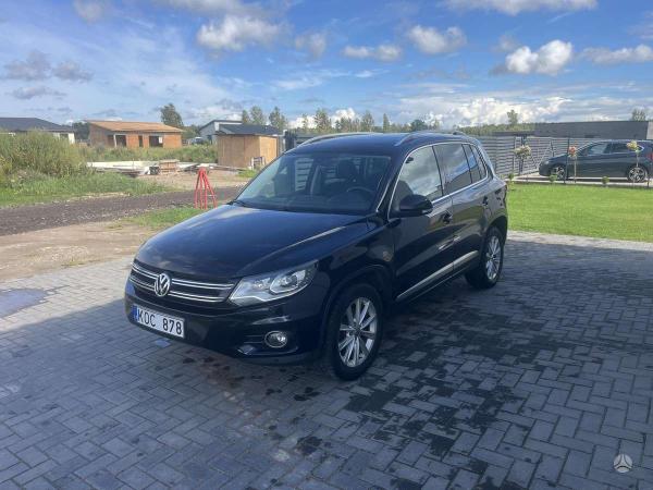 Black Volkswagen Tiguan 2012 in Kaunas, with an engine capacity of 1.97 L and mileage of 355 thousand km for 8100 €, photo 1 on AUTOMOTO.COM.LV