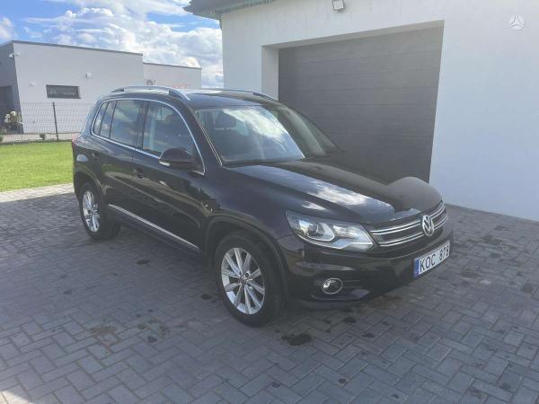 Black Volkswagen Tiguan 2012 in Kaunas, with an engine capacity of 1.97 L and mileage of 355 thousand km for 8100 €, photo 5 on AUTOMOTO.COM.LV