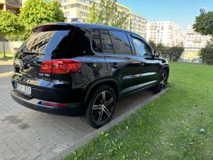 Black Volkswagen Tiguan 2012 in Vilnius, with an engine capacity of 2.00 L and mileage of 238 thousand km for 7300 €, photo 5 on AUTOMOTO.COM.LV