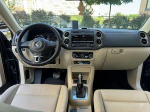 Black Volkswagen Tiguan 2012 in Vilnius, with an engine capacity of 2.00 L and mileage of 238 thousand km for 7300 €, photo 12 on AUTOMOTO.COM.LV