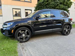 Black Volkswagen Tiguan 2012 in Vilnius, with an engine capacity of 2.00 L and mileage of 238 thousand km for 7300 €, photo 25 on AUTOMOTO.COM.LV