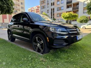 Black Volkswagen Tiguan 2012 in Vilnius, with an engine capacity of 2.00 L and mileage of 238 thousand km for 7300 €, photo 26 on AUTOMOTO.COM.LV