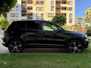 Black Volkswagen Tiguan 2012 in Vilnius, with an engine capacity of 2.00 L and mileage of 238 thousand km for 7300 €, photo 27 on AUTOMOTO.COM.LV