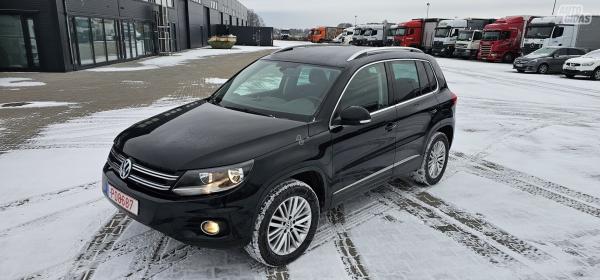 Black Volkswagen Tiguan 2013 in Kaunas, with an engine capacity of 2.00 L and mileage of 290 thousand km for 8650 €, photo 1 on AUTOMOTO.COM.LV