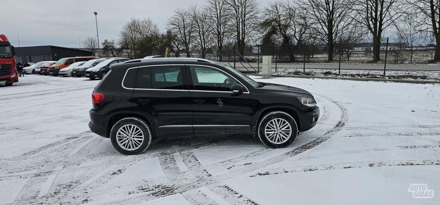 Black Volkswagen Tiguan 2013 in Kaunas, with an engine capacity of 2.00 L and mileage of 290 thousand km for 8650 €, photo 6 on AUTOMOTO.COM.LV