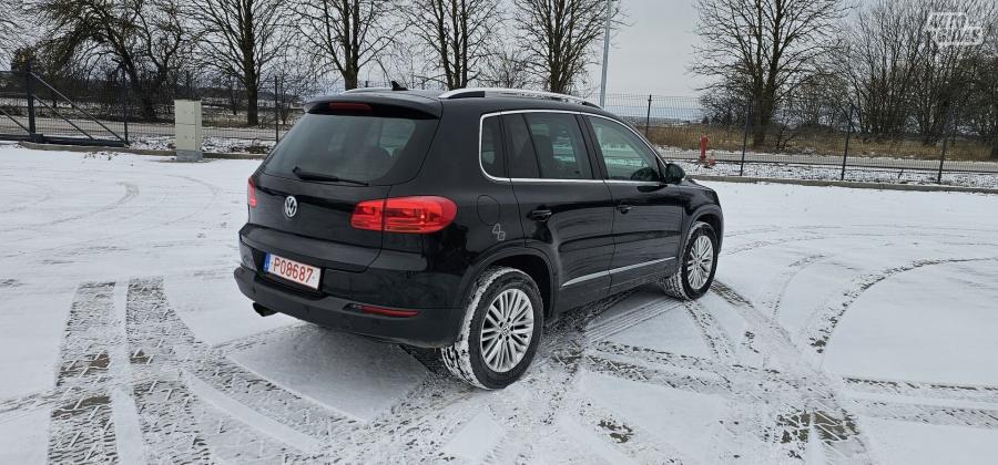 Black Volkswagen Tiguan 2013 in Kaunas, with an engine capacity of 2.00 L and mileage of 290 thousand km for 8650 €, photo 7 on AUTOMOTO.COM.LV