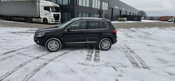 Black Volkswagen Tiguan 2013 in Kaunas, with an engine capacity of 2.00 L and mileage of 290 thousand km for 8650 €, photo 10 on AUTOMOTO.COM.LV