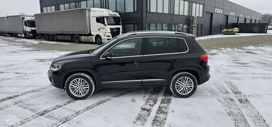 Black Volkswagen Tiguan 2013 in Kaunas, with an engine capacity of 2.00 L and mileage of 290 thousand km for 8650 €, photo 11 on AUTOMOTO.COM.LV