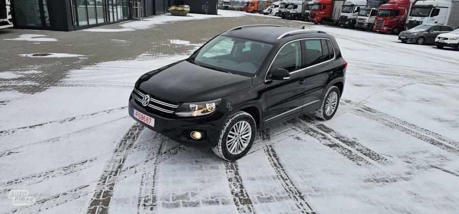 Black Volkswagen Tiguan 2013 in Kaunas, with an engine capacity of 2.00 L and mileage of 290 thousand km for 8650 €, photo 13 on AUTOMOTO.COM.LV
