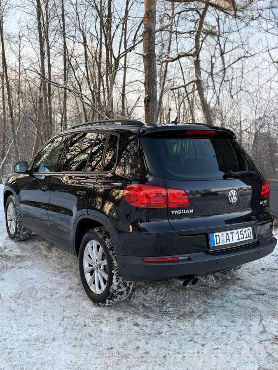 Black Volkswagen Tiguan 2013 in Utena, with an engine capacity of 1.97 L and mileage of 270 thousand km for 10950 €, photo 7 on AUTOMOTO.COM.LV